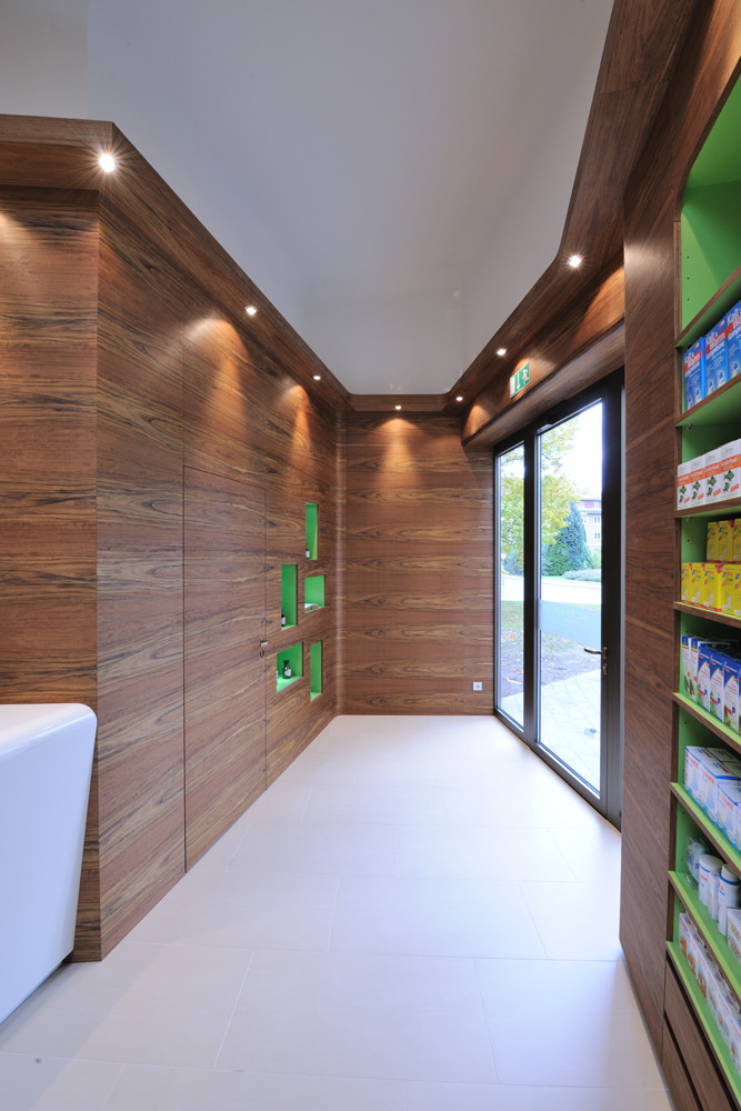 Gallery of Chemist's shop in the town wood / Atelier st - 10