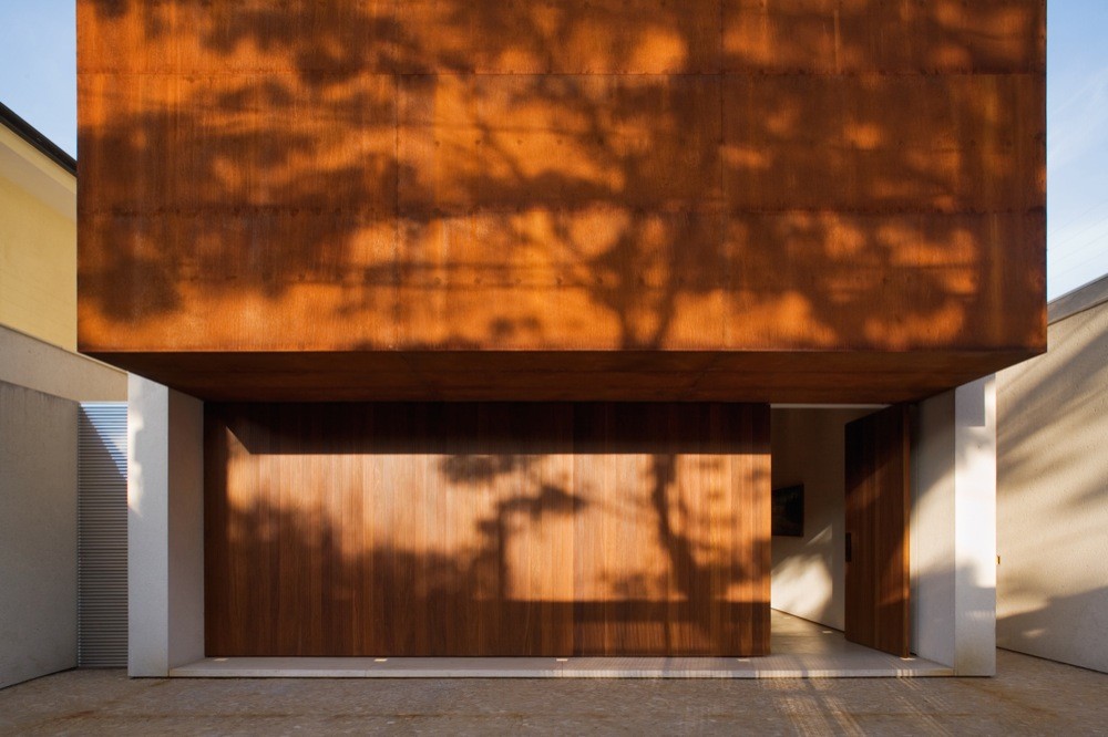 Gallery of Corten House / Marcio Kogan - 7