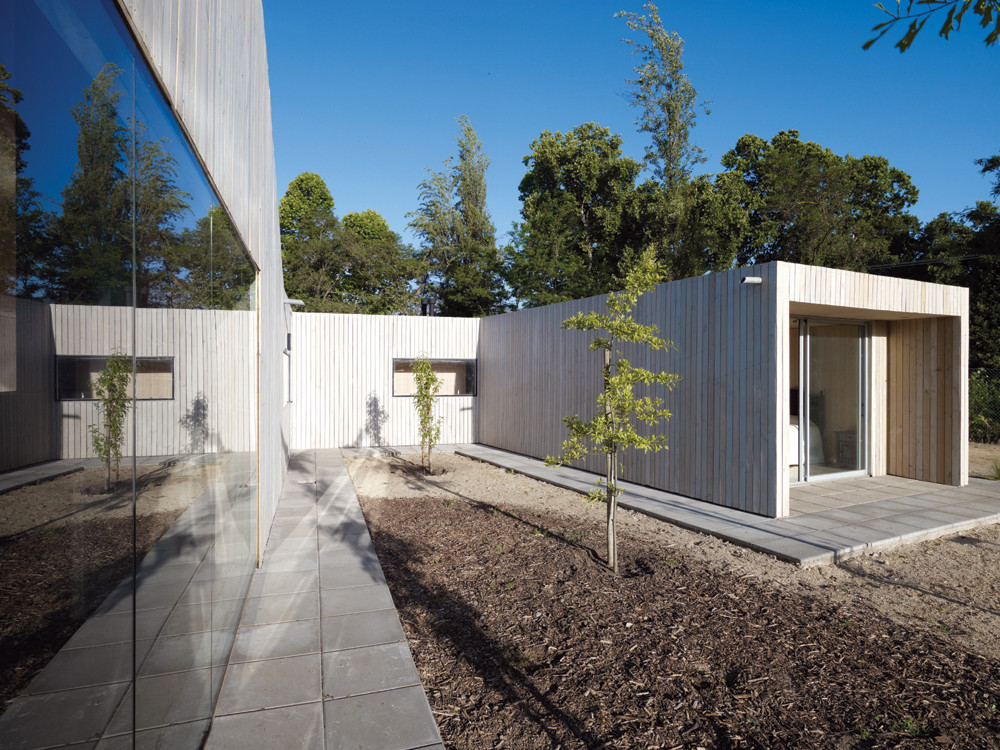 Gallery of Finger Joint House / LAND Arquitectos - 8
