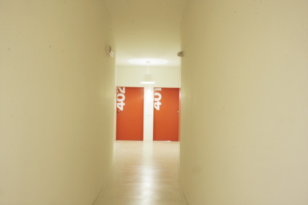 Galería de Edificio Flex Rojo / Cerejeira Fontes Arquitectos - 5