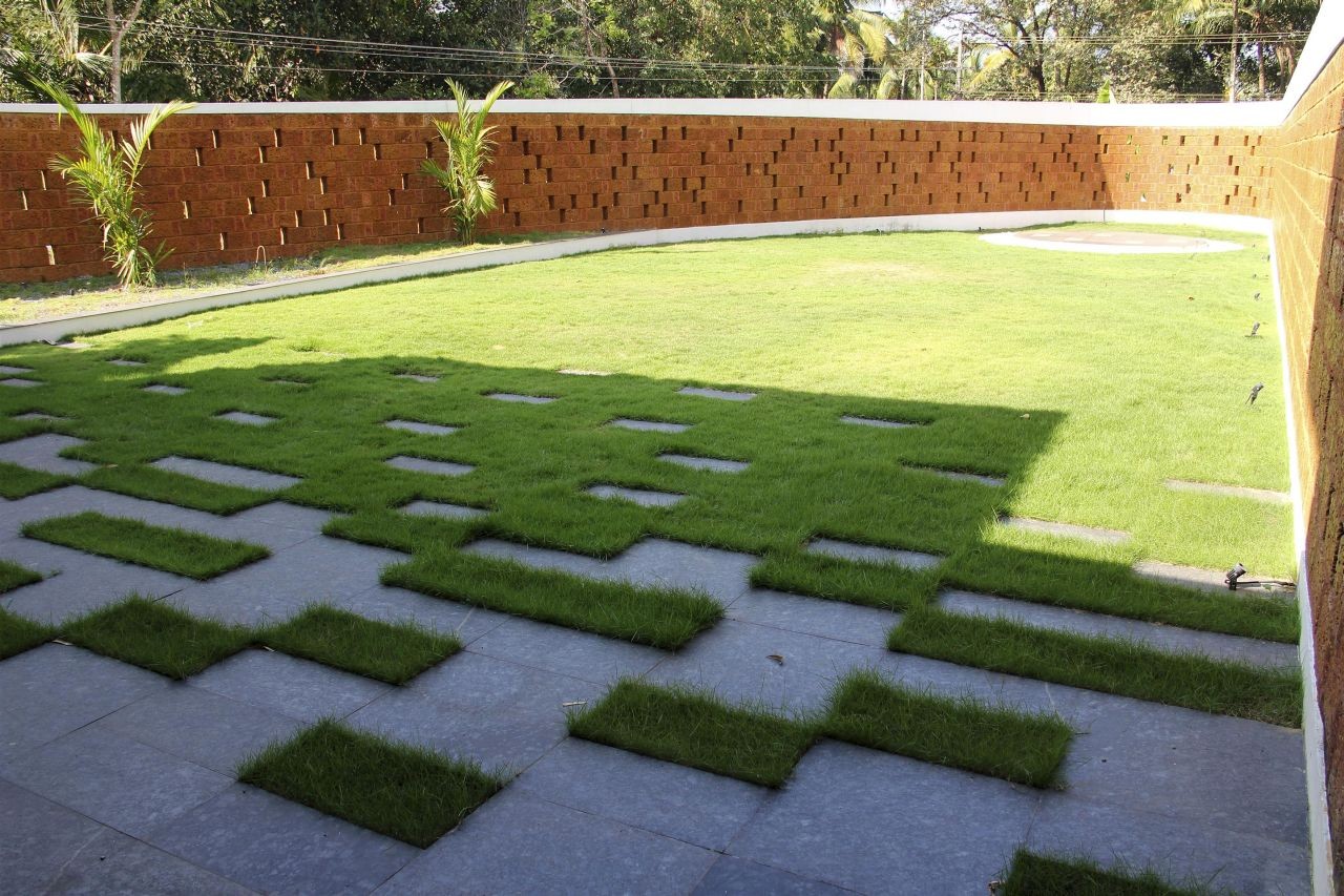 Gallery of The Running Wall Residence / LIJO RENY architects - 41