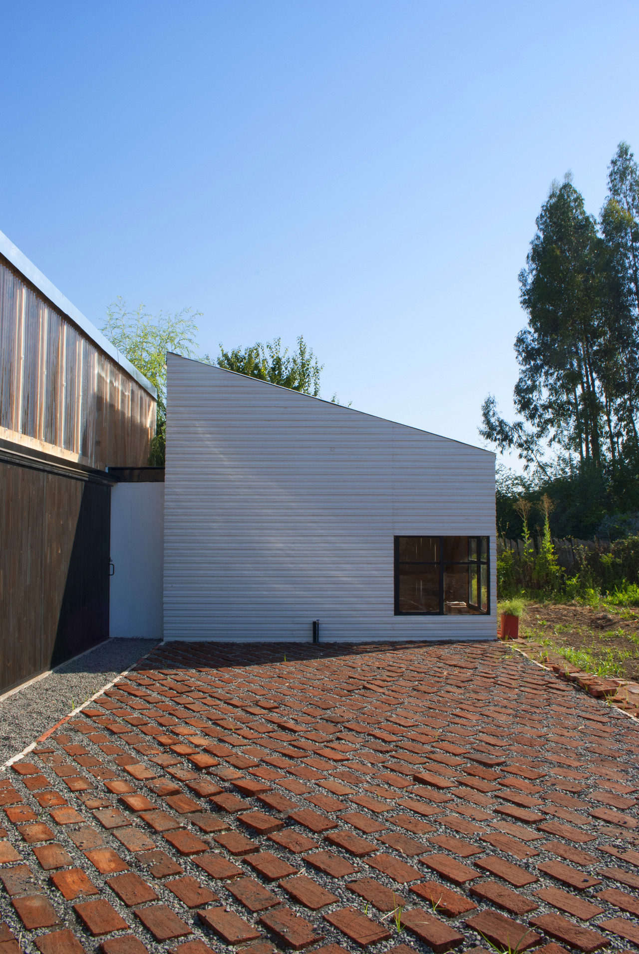 Galería de Rehabilitación de capilla rural en Teno: una extensión del ...