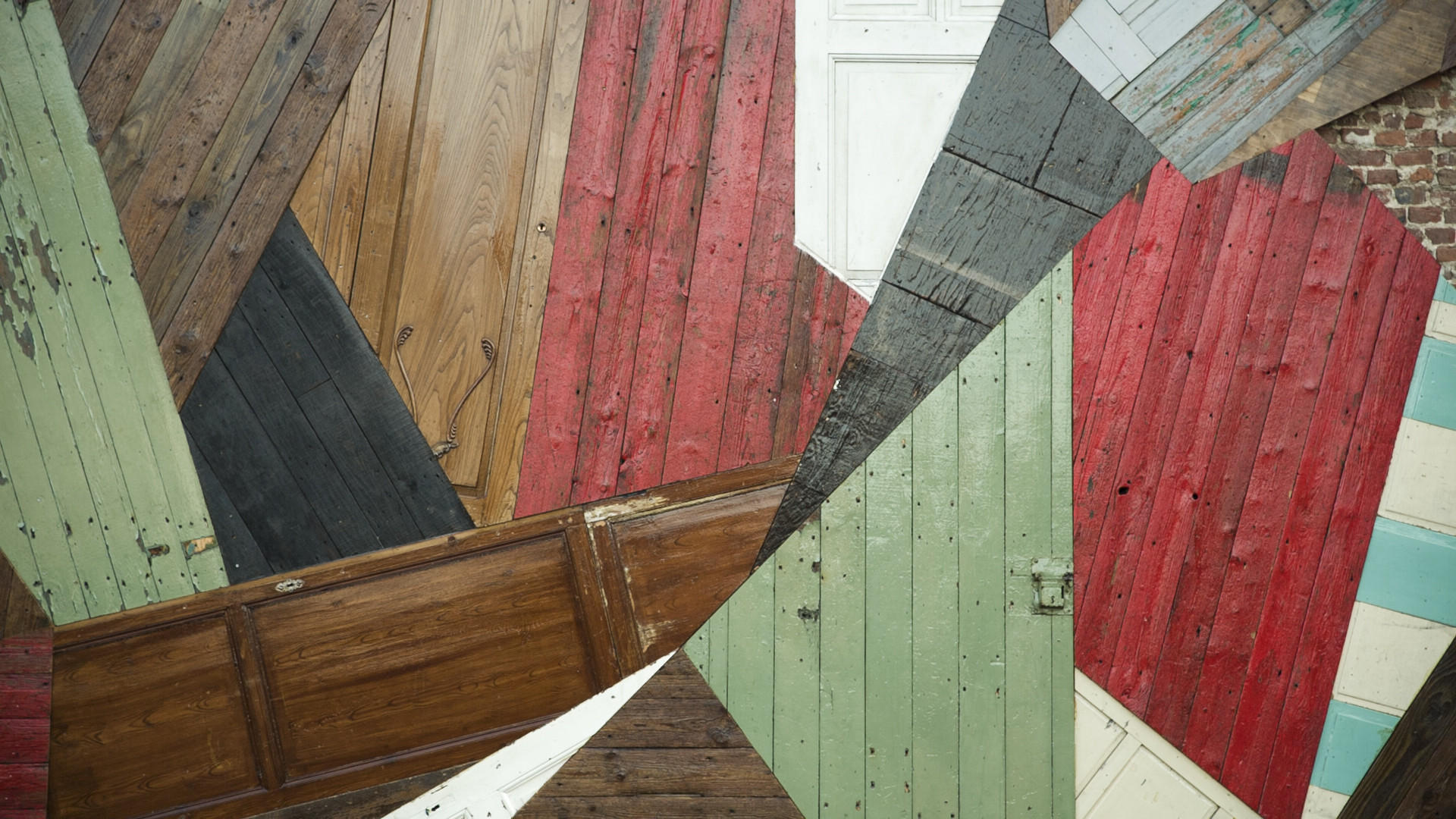 Gallery of Strook Creates Colorful Street Murals with Recycled Wood - 19