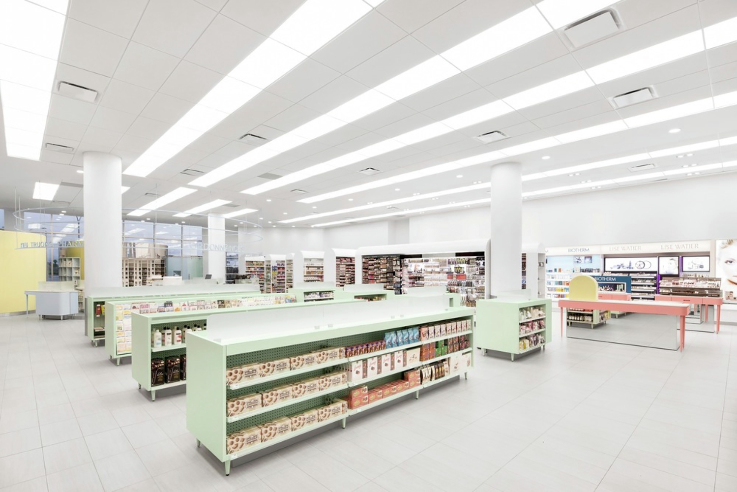 Gallery of Uniprix Pharmacy and Medical Center / Jean de Lessard ...