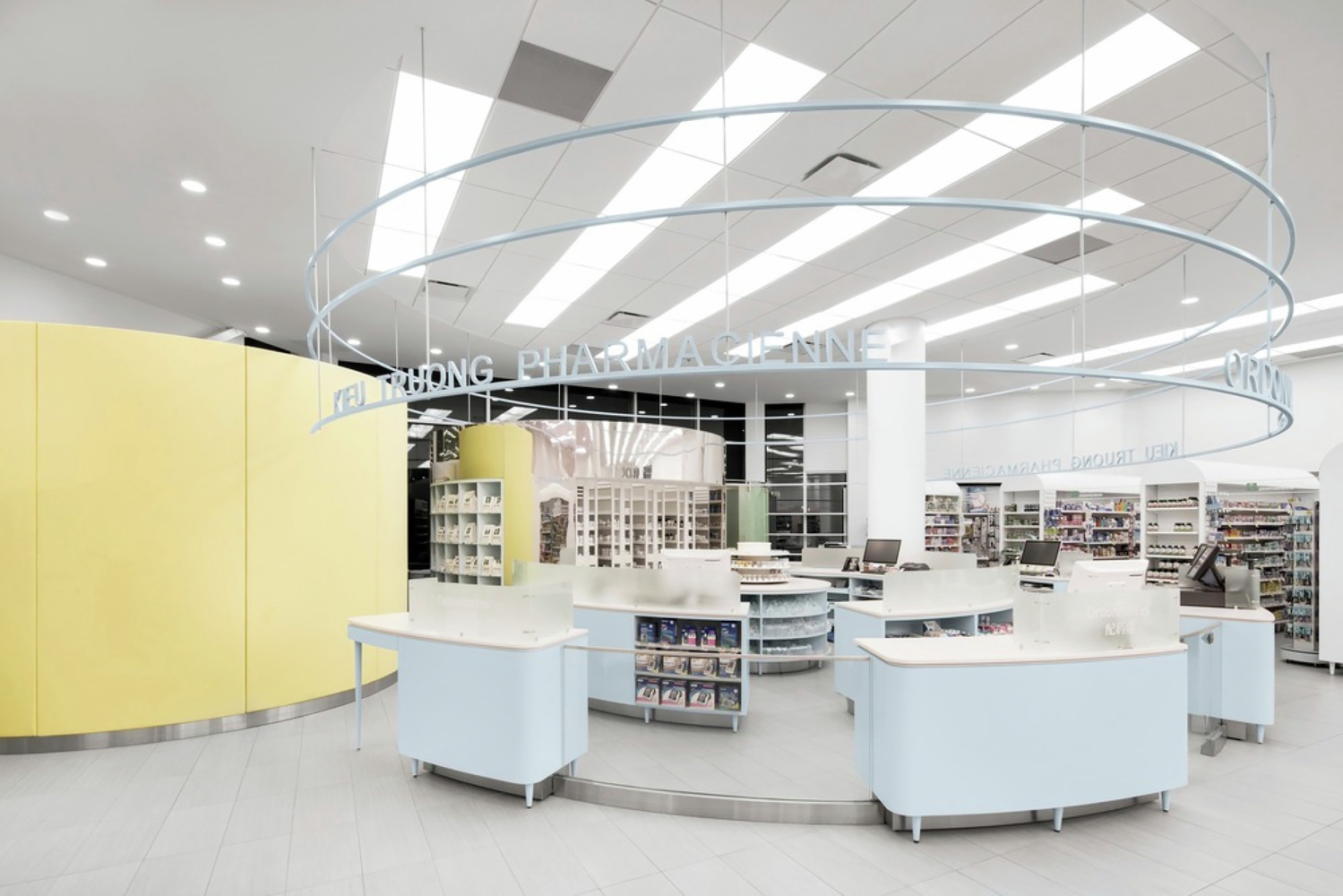 Gallery of Uniprix Pharmacy and Medical Center / Jean de Lessard ...