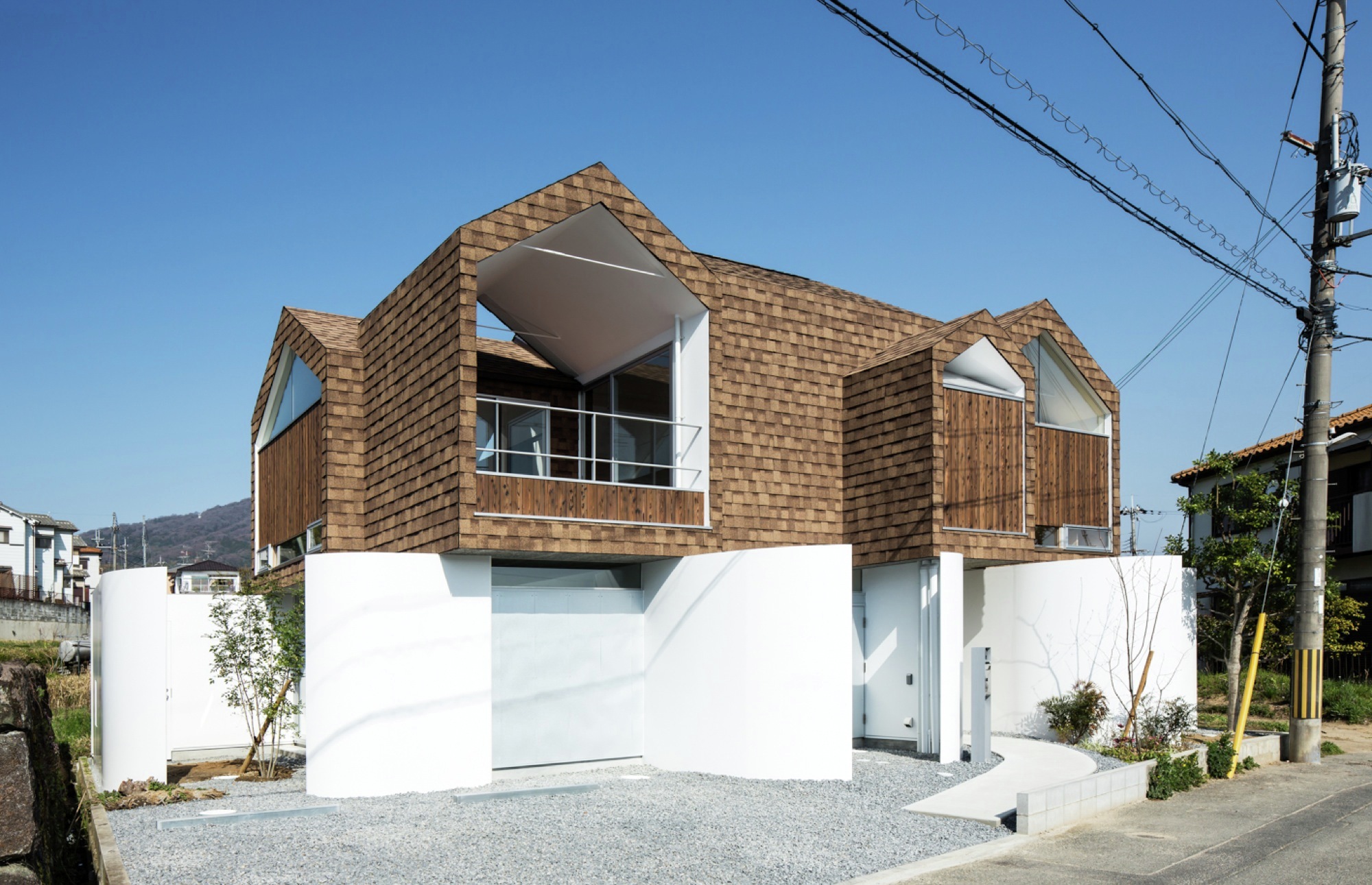 Gallery of House on Stylobate / y+M - 9