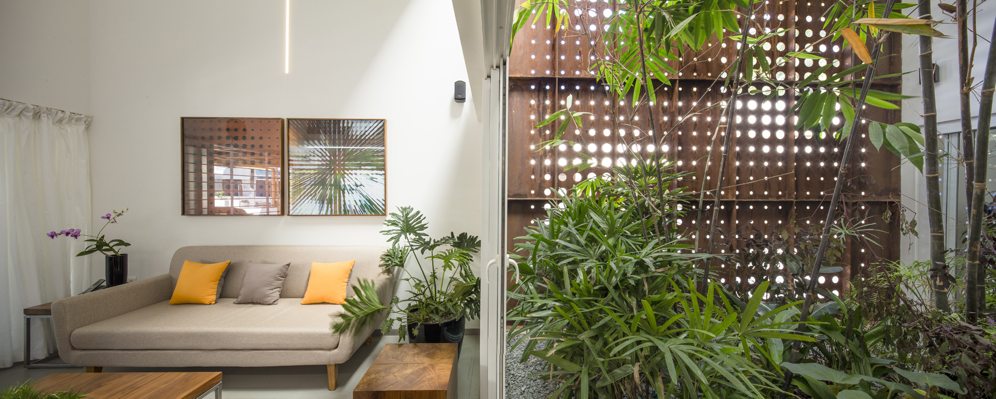 Gallery of The Breathing Wall Residence / LIJO.RENY Architects - 12