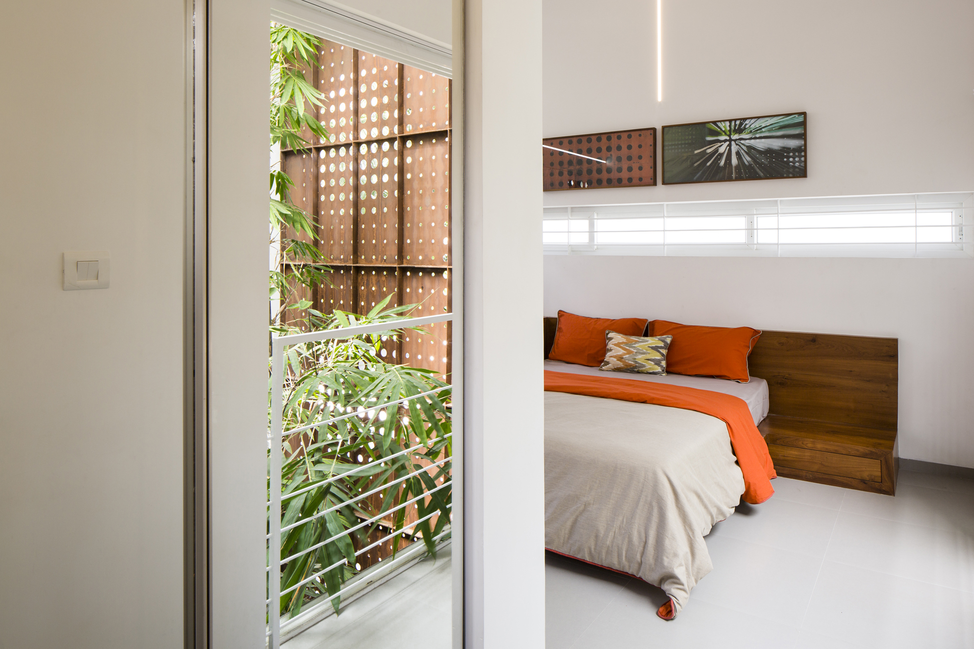 Gallery of The Breathing Wall Residence / LIJO.RENY Architects - 9