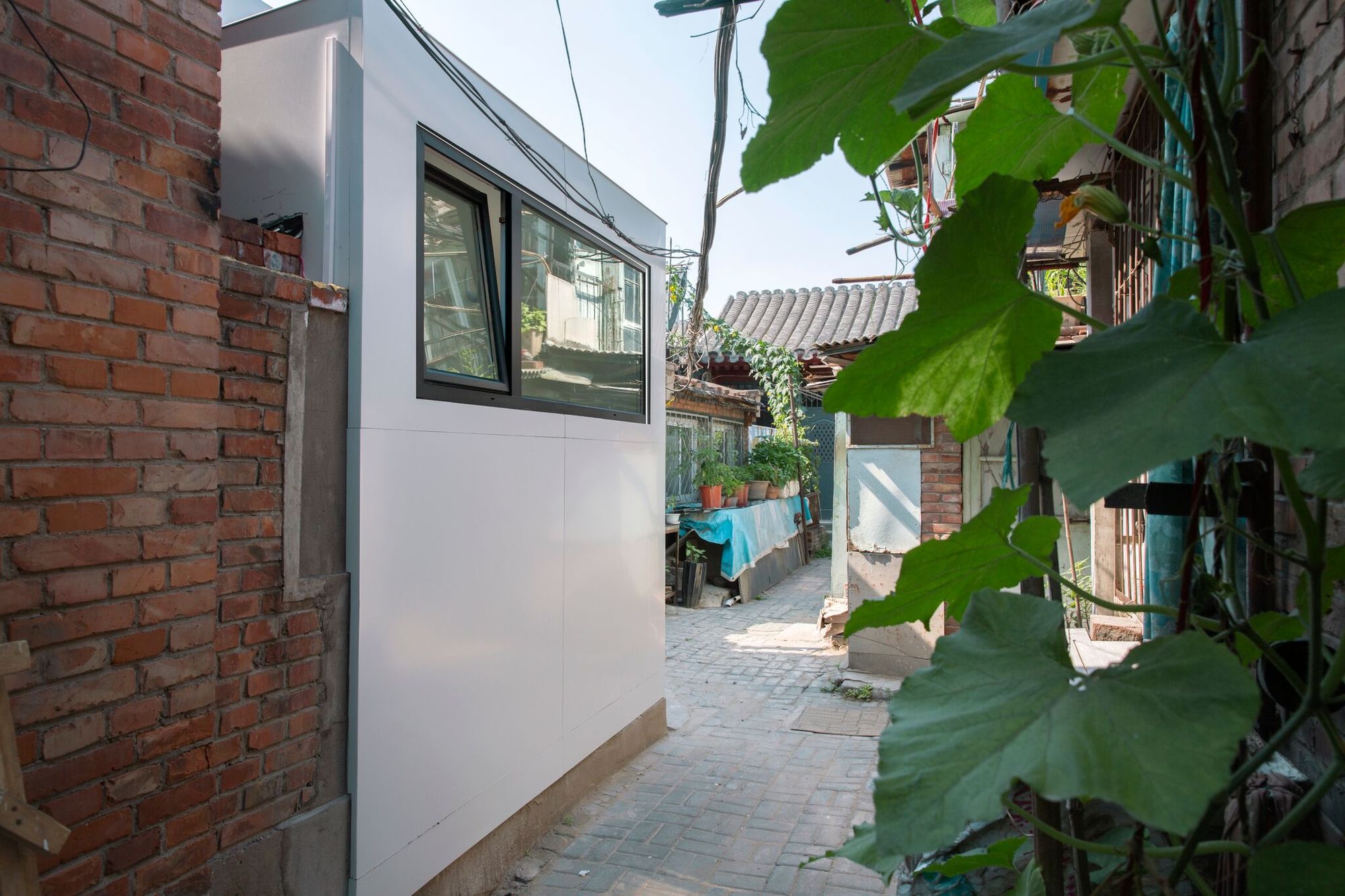 Gallery of Mrs. Fan's Plugin House / People's Architecture Office - 11