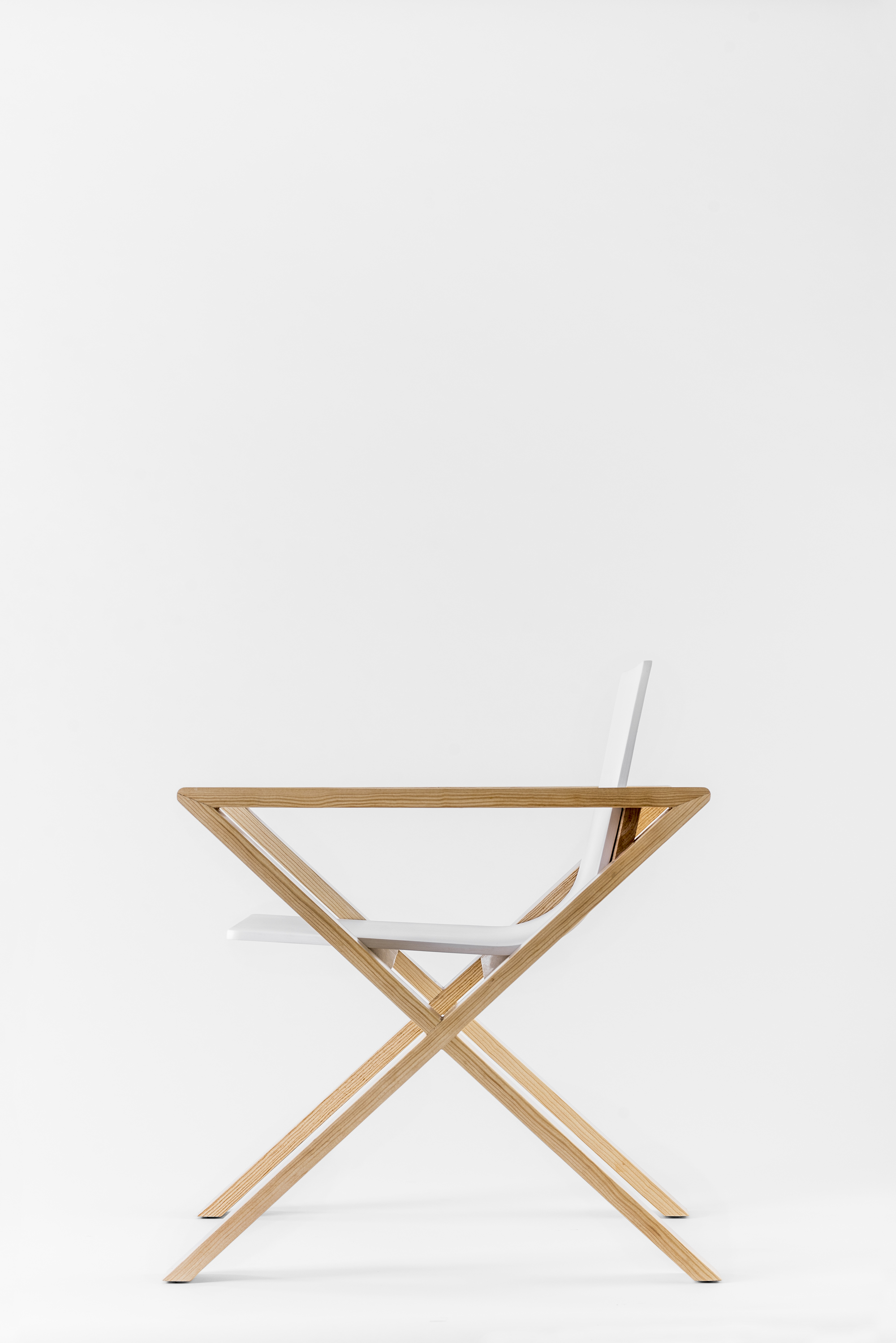 Galería de X Chair, un asiento moderno y ergonómico de madera moldeada - 2