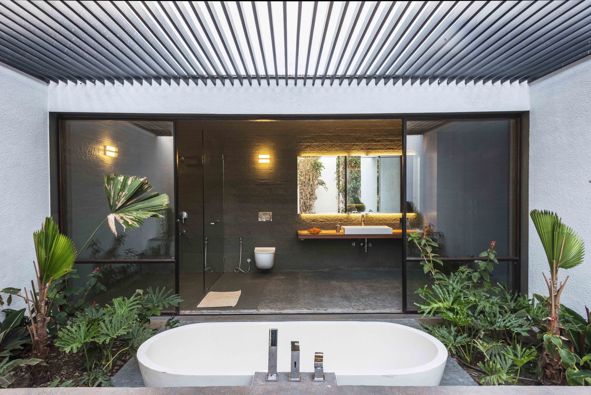 Gallery of The Twin Houses / SPASM Design Architects - 17