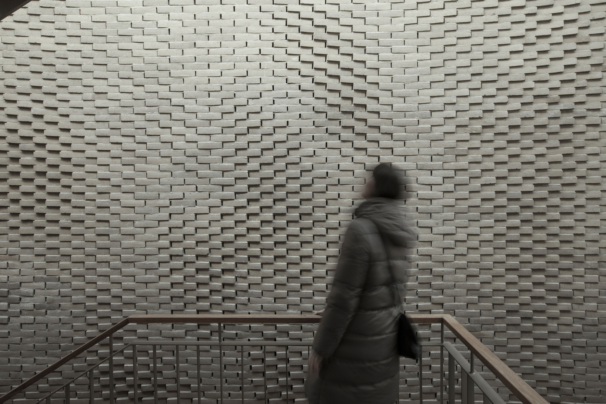 This Hand-Laid Brick Feature Wall Was Inspired by Soundwaves in Water ...