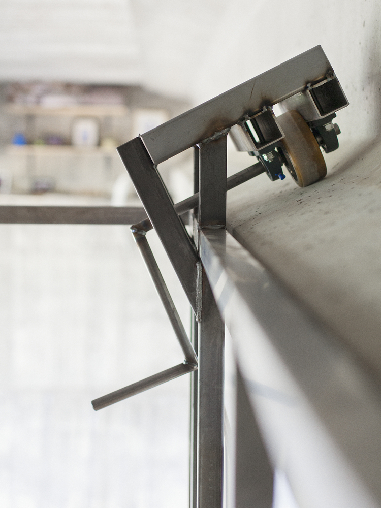 Gallery of Hidden Studio Beneath a Busy Bridge Provides Creative ...