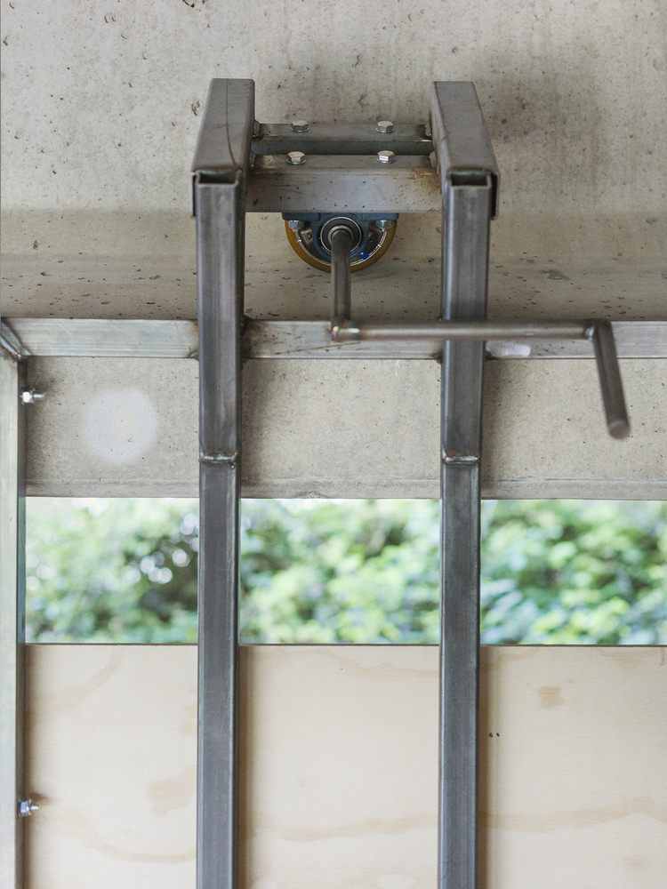 Gallery of Hidden Studio Beneath a Busy Bridge Provides Creative ...