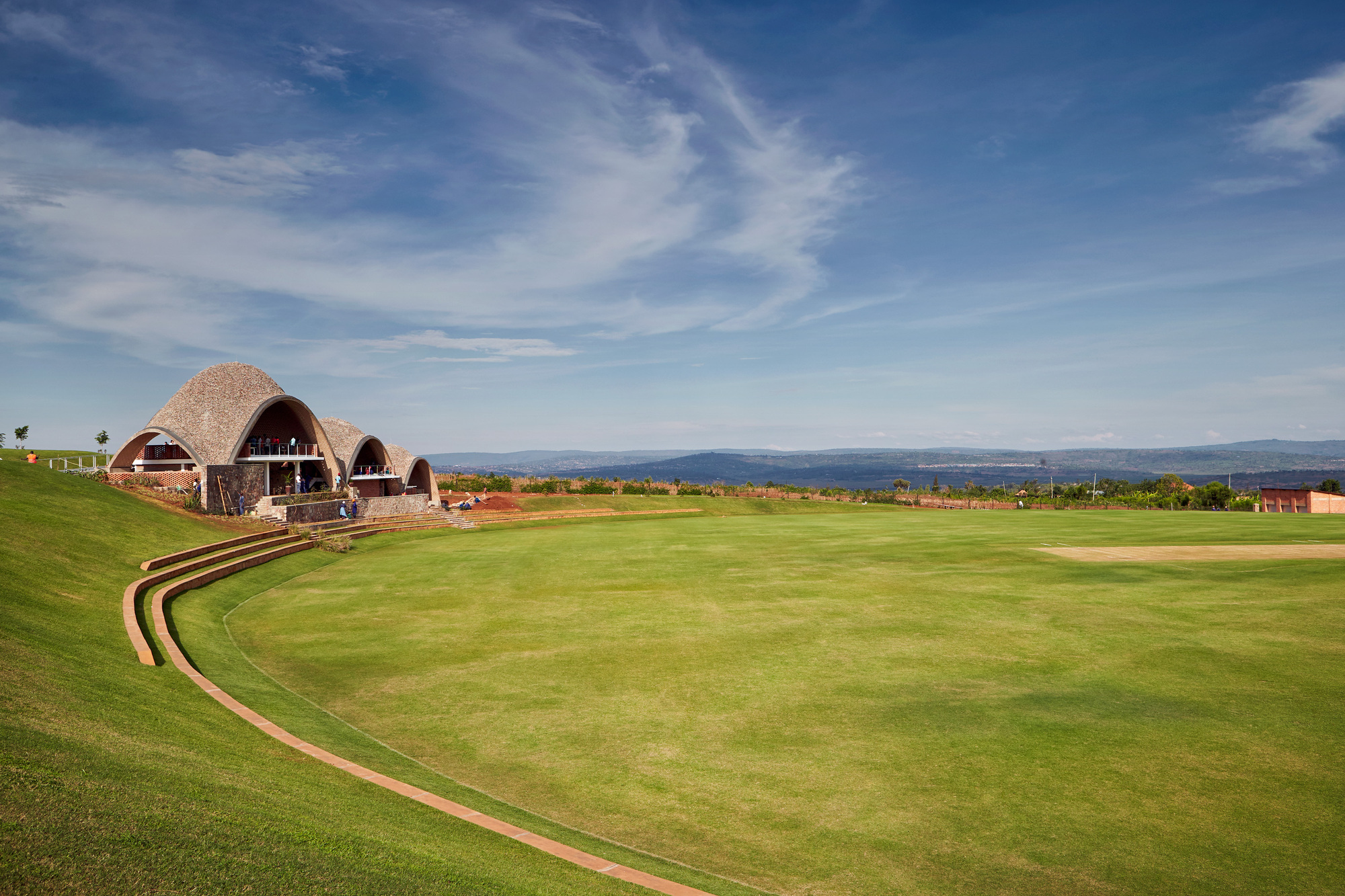Gallery of Rwanda Cricket Stadium / Light Earth Designs - 13