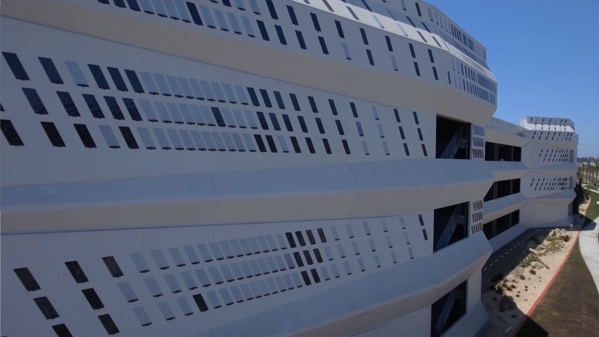 Gallery of This E-Paper Tile Facade Is Inspired by the WW1 Military ...
