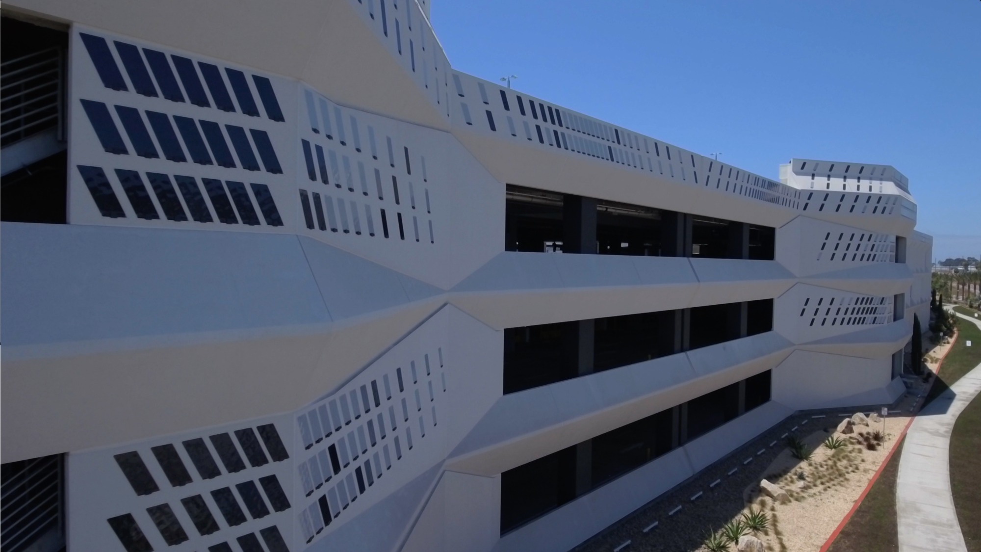 Gallery of This E-Paper Tile Facade Is Inspired by the WW1 Military ...