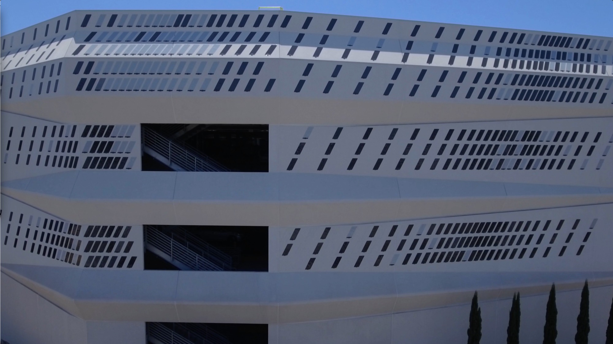 Gallery of This E-Paper Tile Facade Is Inspired by the WW1 Military ...