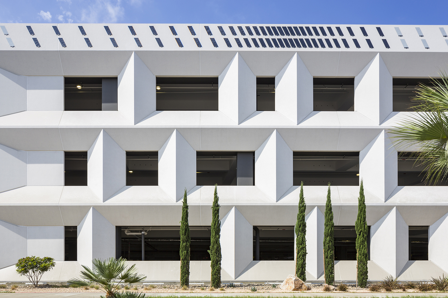 Gallery of This E-Paper Tile Facade Is Inspired by the WW1 Military ...