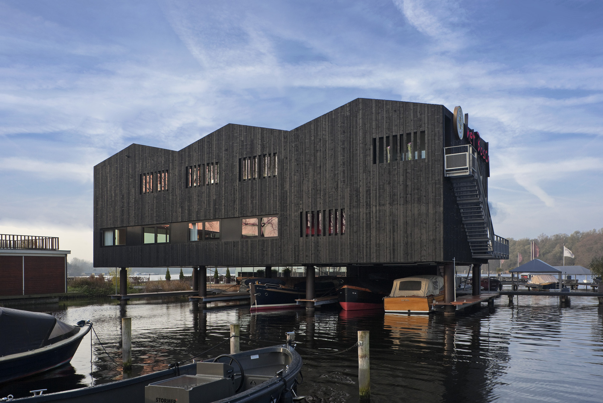 Gallery of 10 Boathouses That Take Architecture Over the Edge of Dry ...