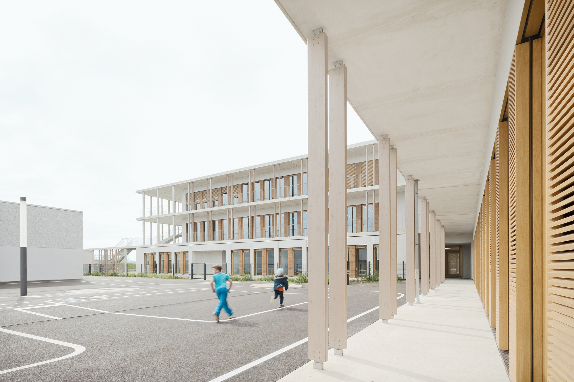Gallery of Four Primary Schools in Modular Design / wulf architekten - 13