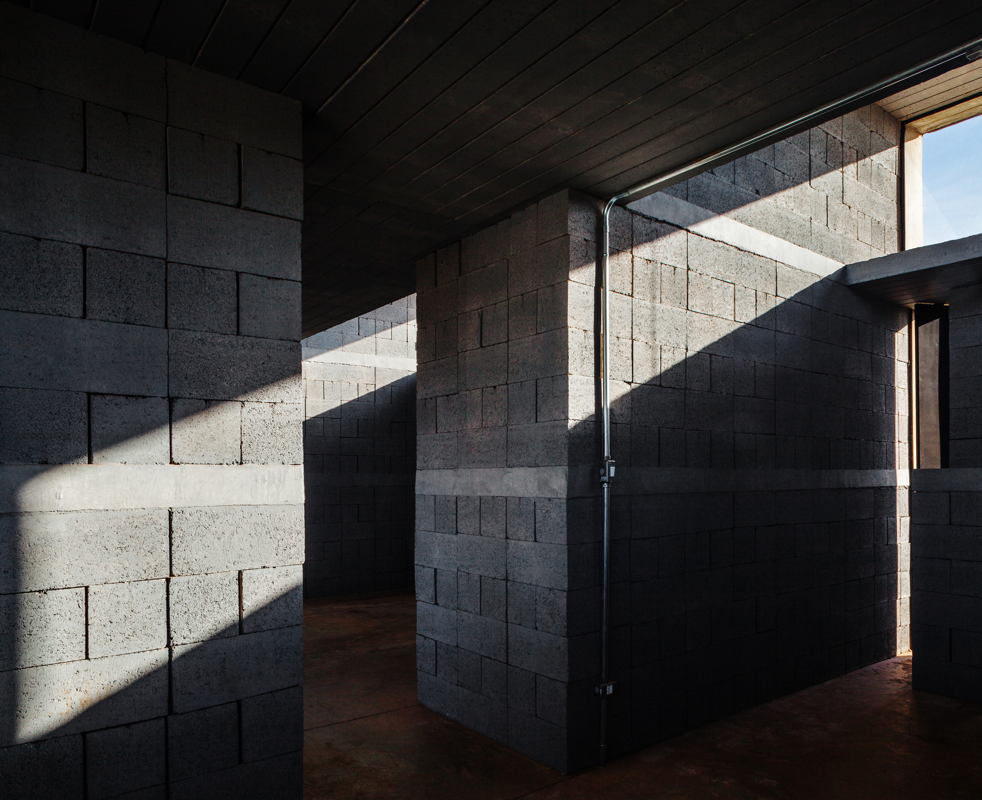Gallery of Headquarters for a Block Factory / Vão - 10
