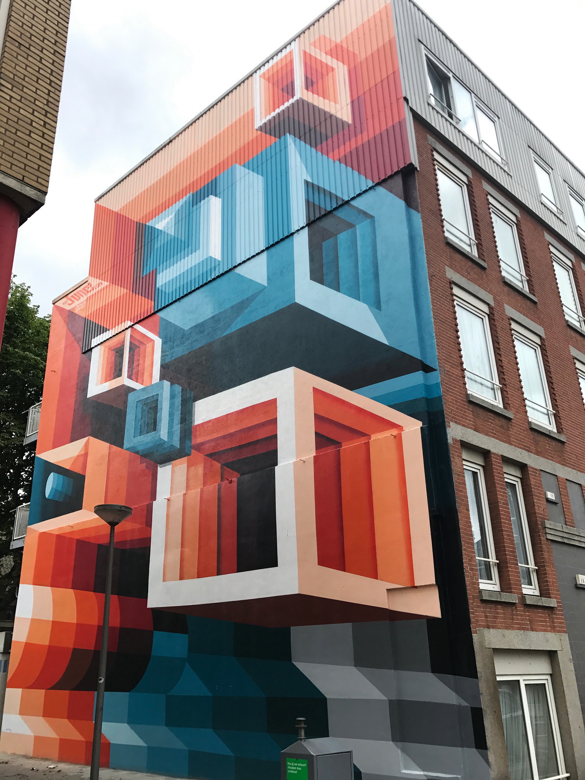 Gallery of Artist Mr. June Brings Urban Facades to Life with Layered ...