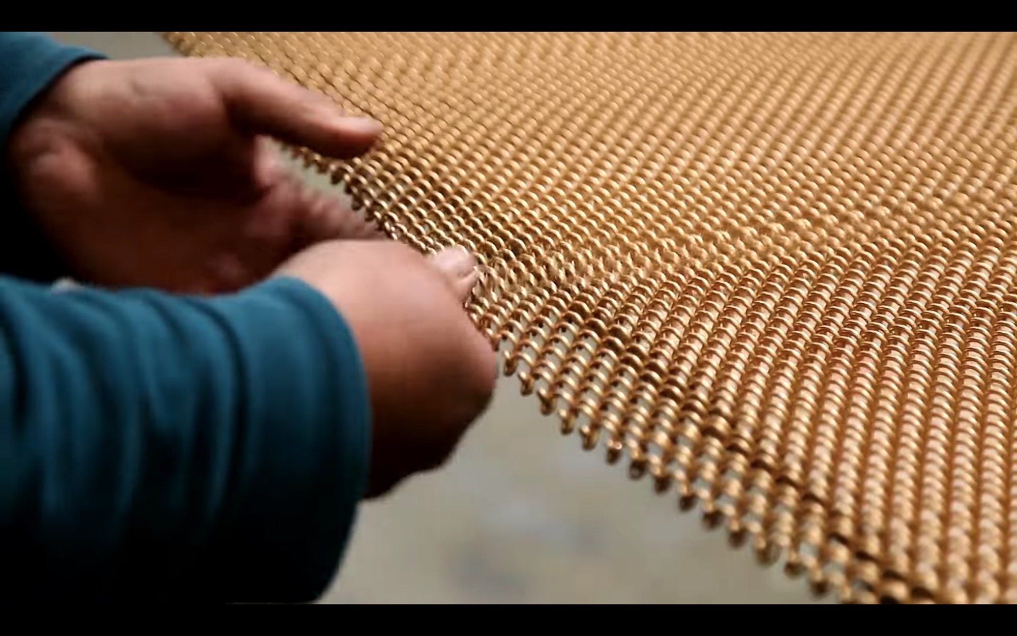 Gallery of Sliding Room Dividers: Flexible Spaces Made of Metal Mesh - 20