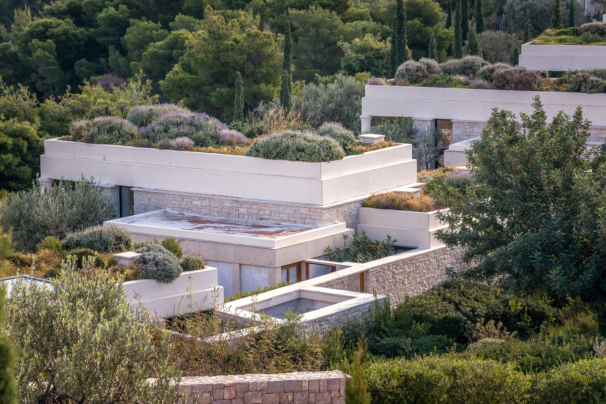 Gallery of Amanzoe Luxury Hotel & Villas / Edward Tuttle ...