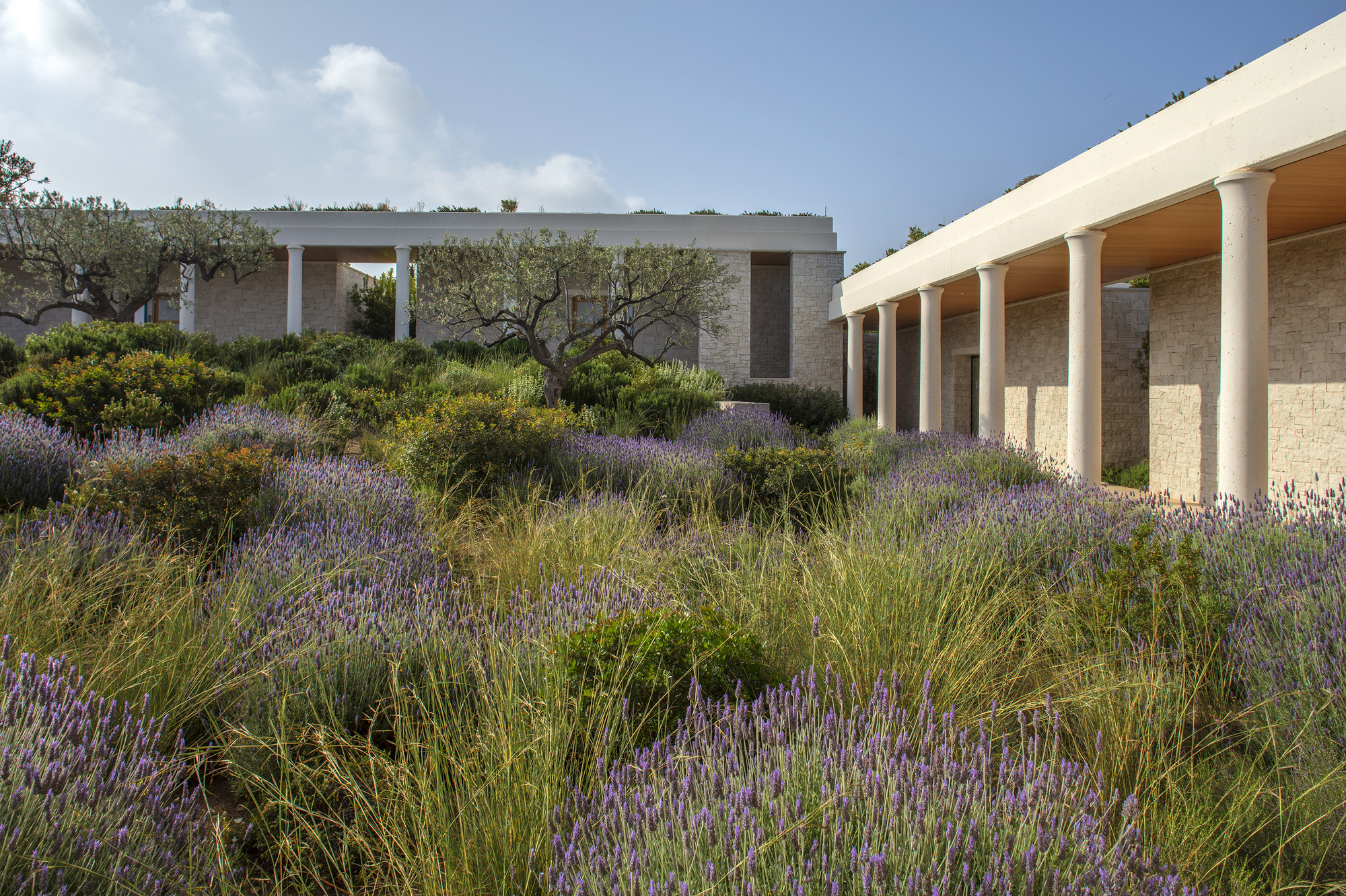 Gallery of Amanzoe Luxury Hotel & Villas / Edward Tuttle ...