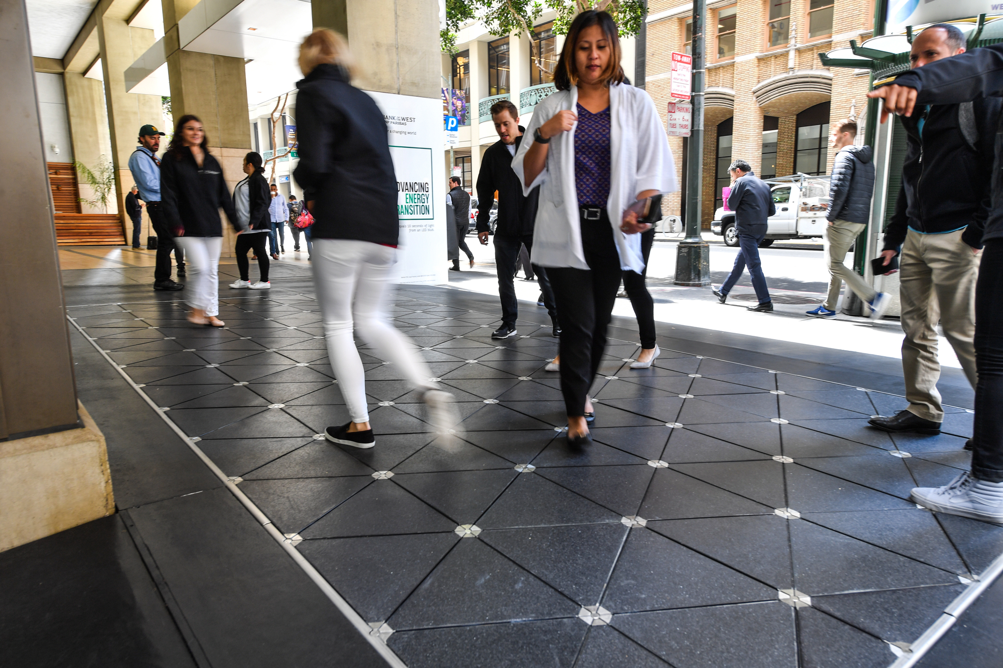 Gallery of Sidewalks That Generate Energy Through The Steps - 5