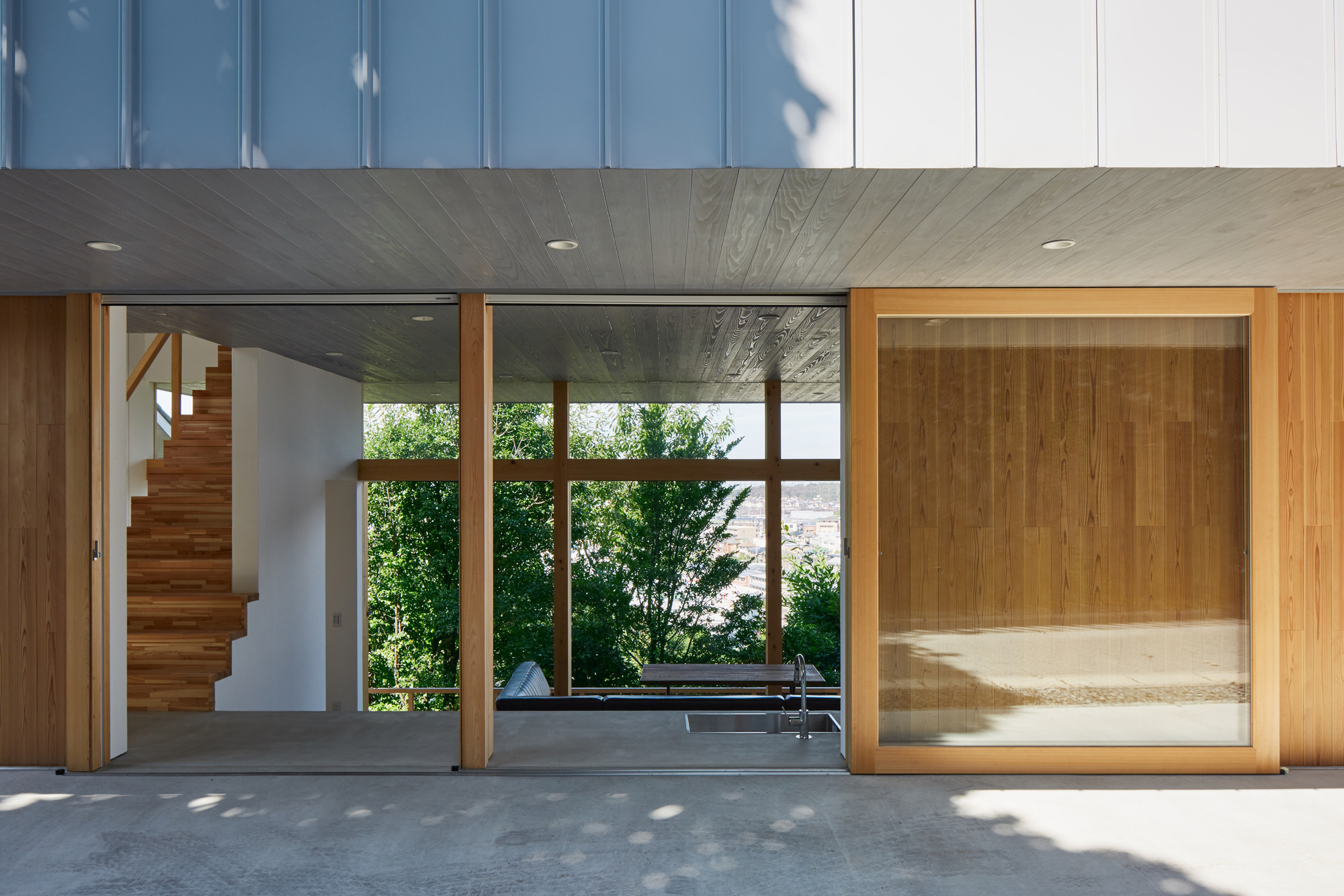 Gallery of Three Tiered Platforms House / ihrmk - 54