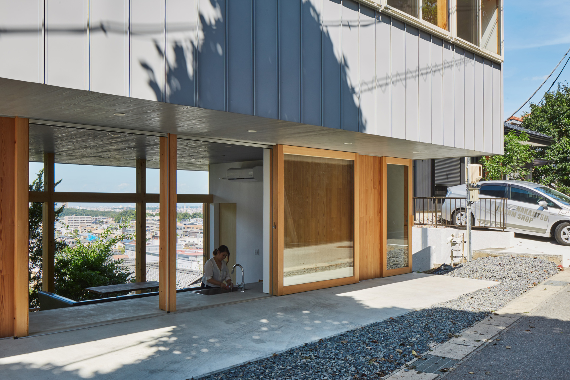 Gallery of Three Tiered Platforms House / ihrmk - 42