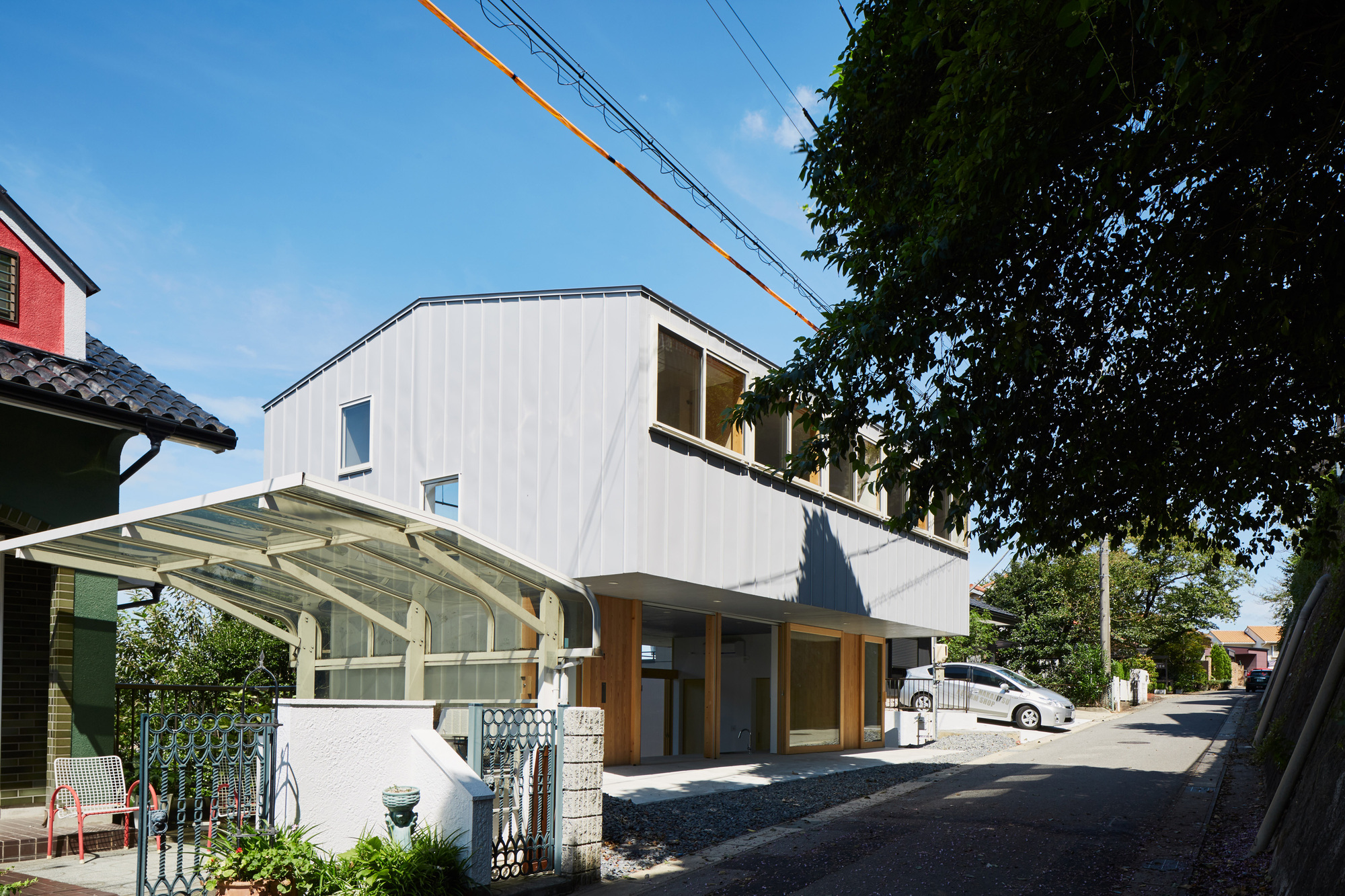 Gallery of Three Tiered Platforms House / ihrmk - 39