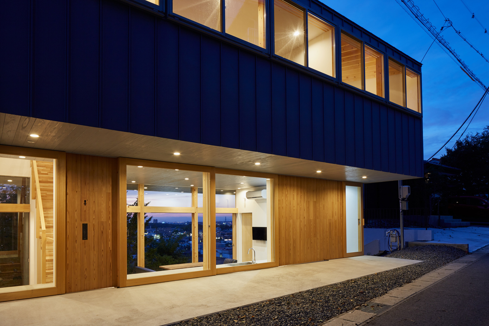 Gallery of Three Tiered Platforms House / ihrmk - 10