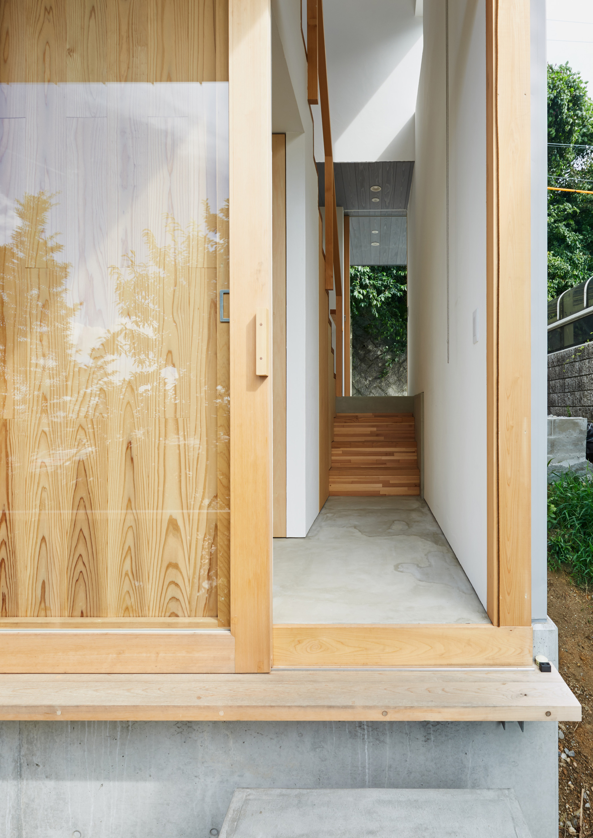 Gallery of Three Tiered Platforms House / ihrmk - 49