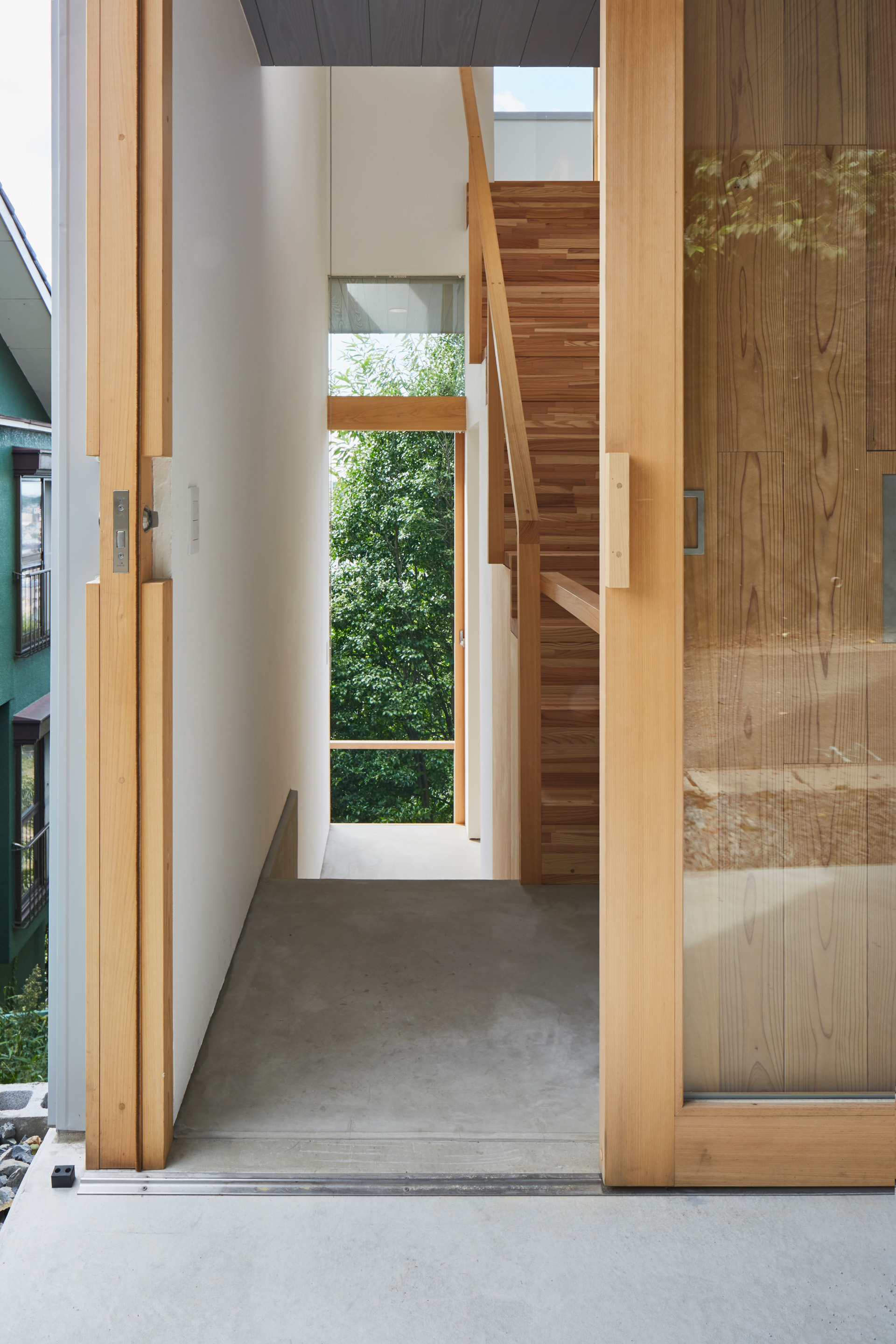 Gallery of Three Tiered Platforms House / ihrmk - 17