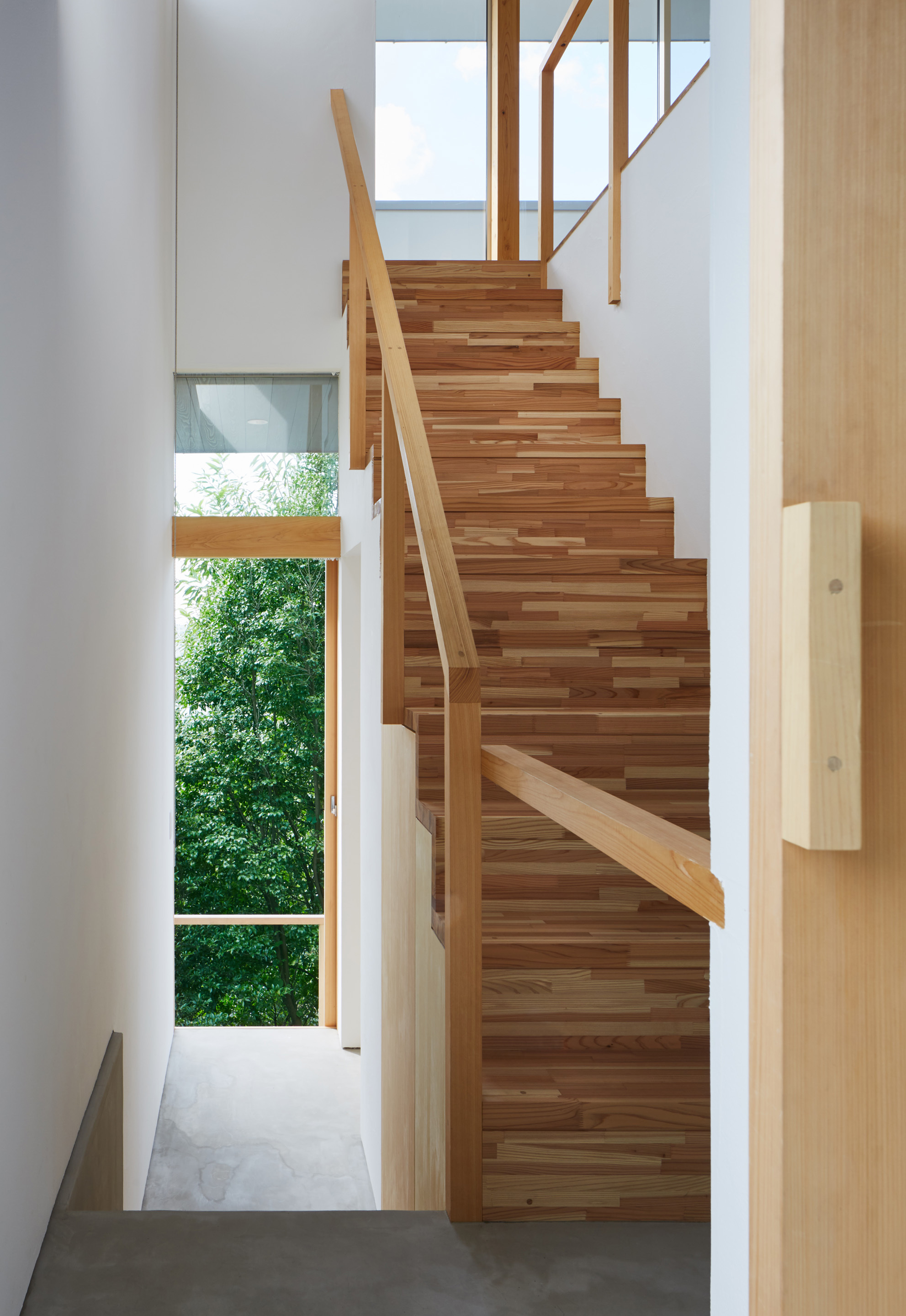 Gallery of Three Tiered Platforms House / ihrmk - 23