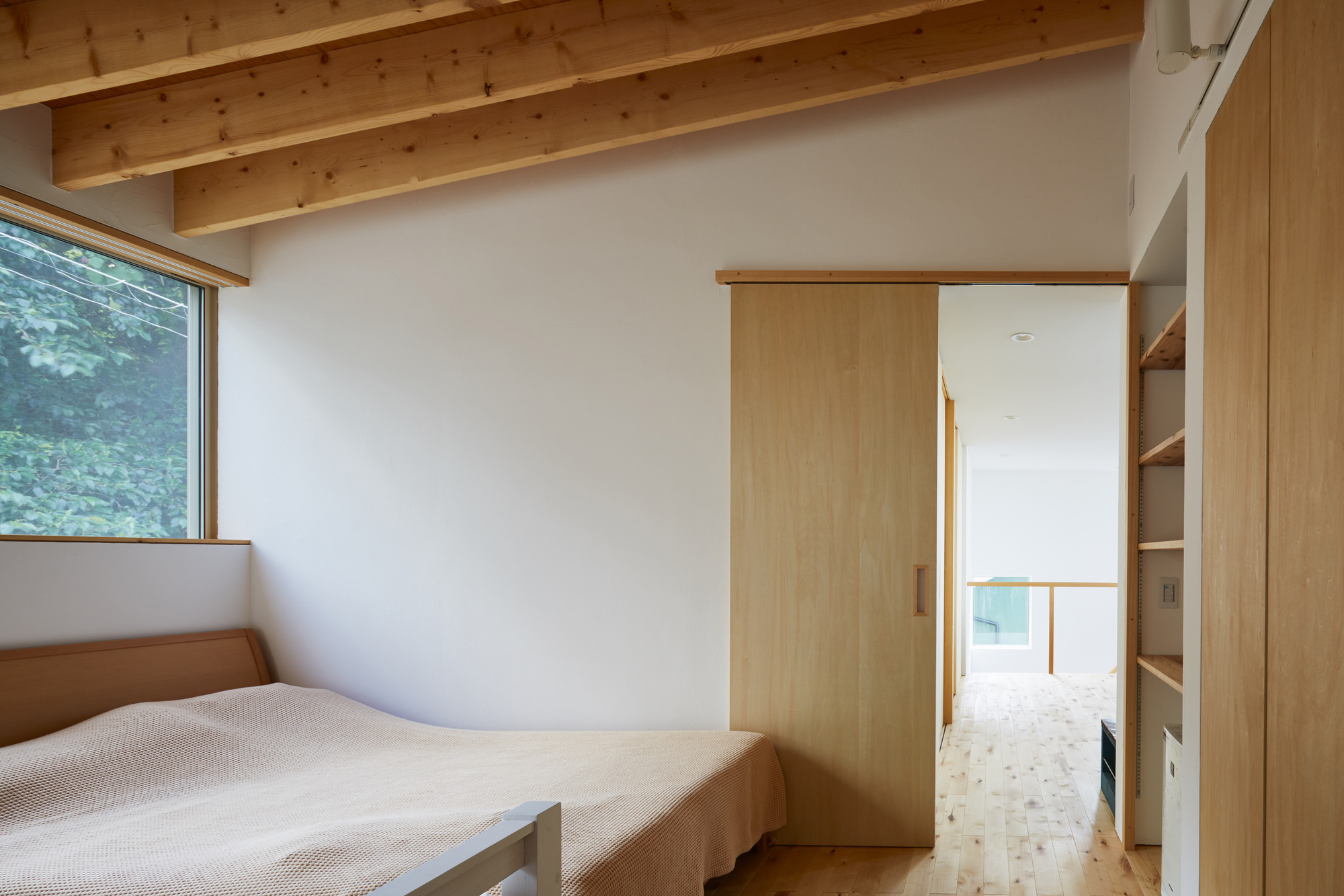 Gallery of Three Tiered Platforms House / ihrmk - 16