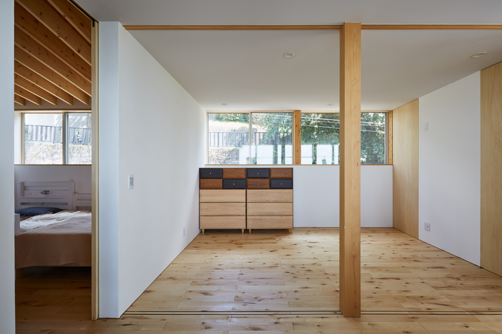 Gallery of Three Tiered Platforms House / ihrmk - 14