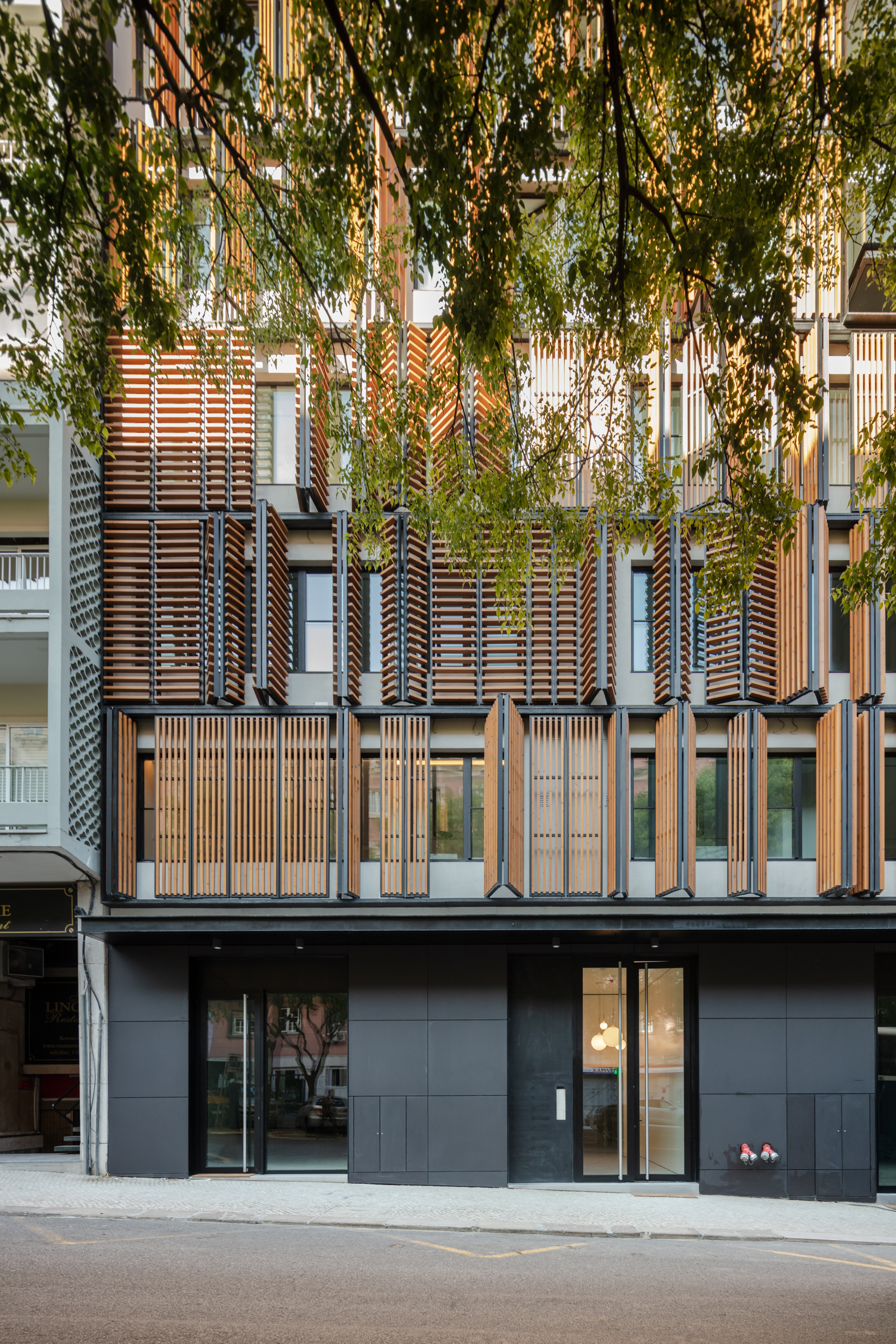 Gallery of Lisbon Wood Residential Building / Plano Humano Arquitectos - 8