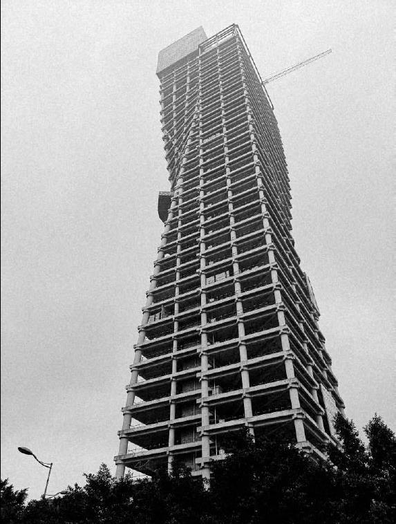 Gallery of Construction in Progress on Twisting Towers in Southwest ...