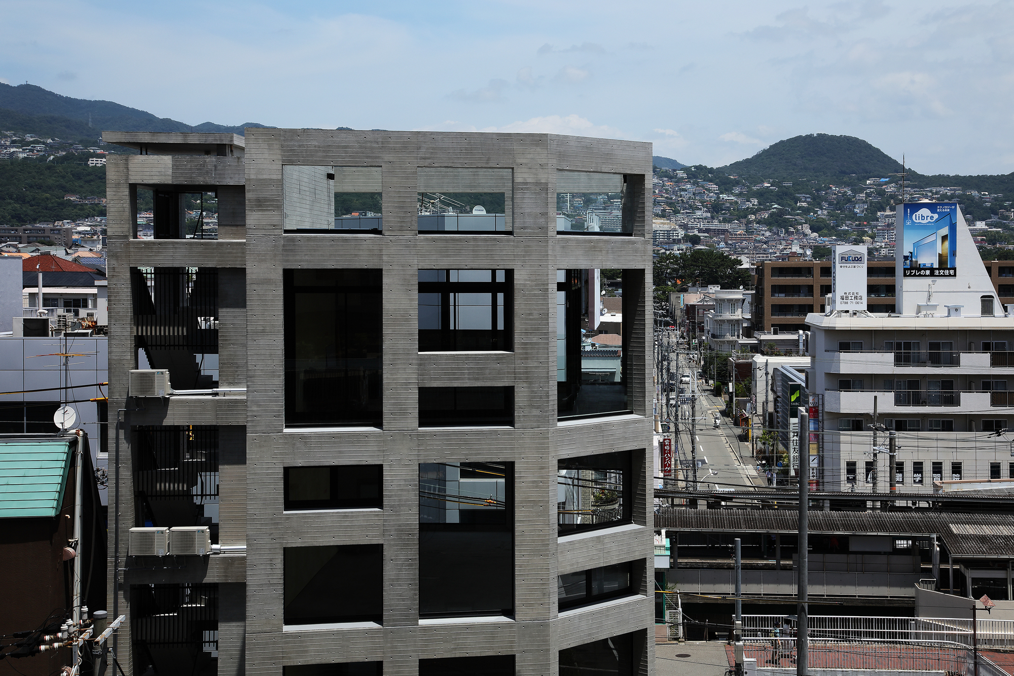 Gallery of Grid Commercial Building / T-Square Design Associates - 12