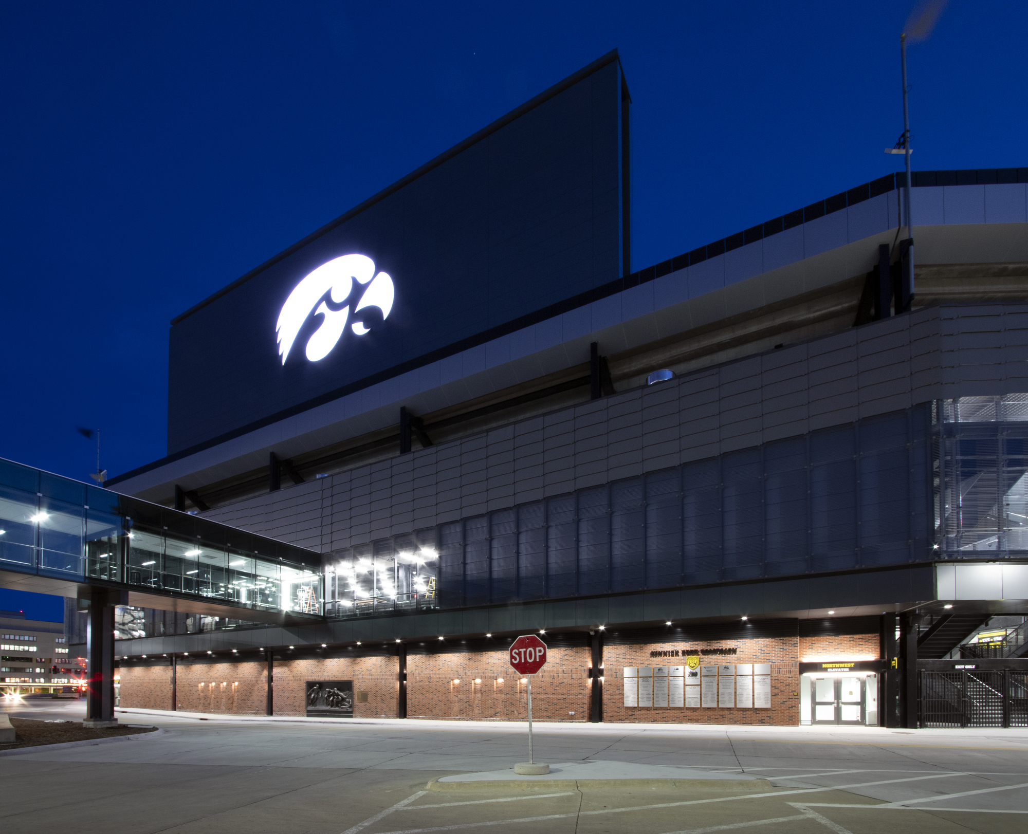 Gallery of How to Construct a Stadium Facade from Custom Glass While on ...