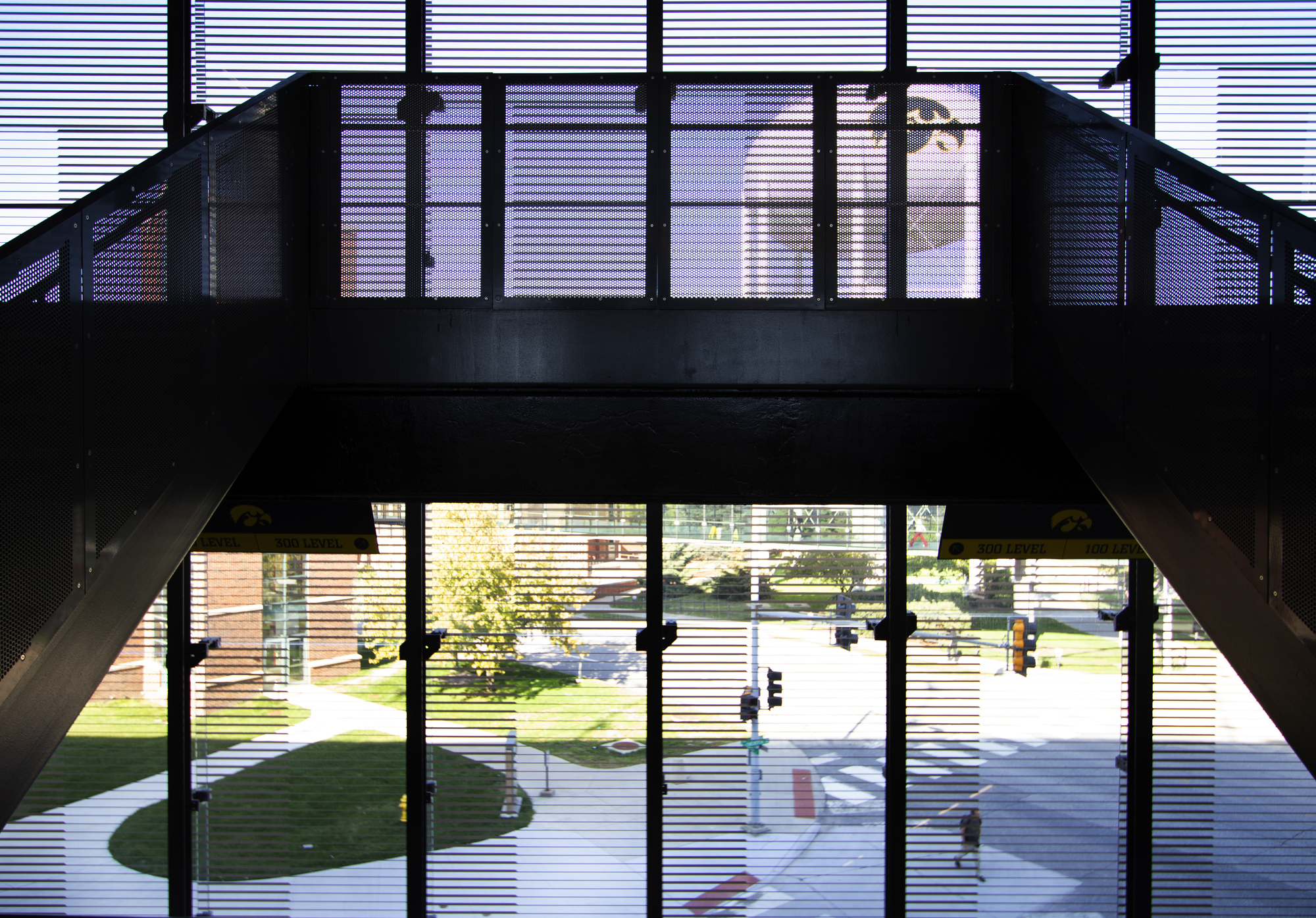 Gallery of How to Construct a Stadium Facade from Custom Glass While on ...