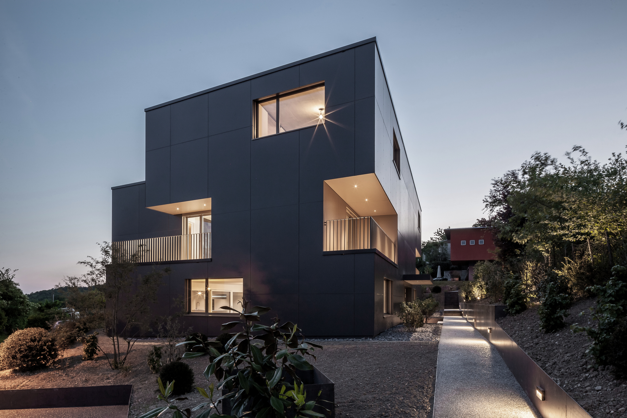Gallery of Multi Unit House Riedholz / Tormen Architekten AG - 6