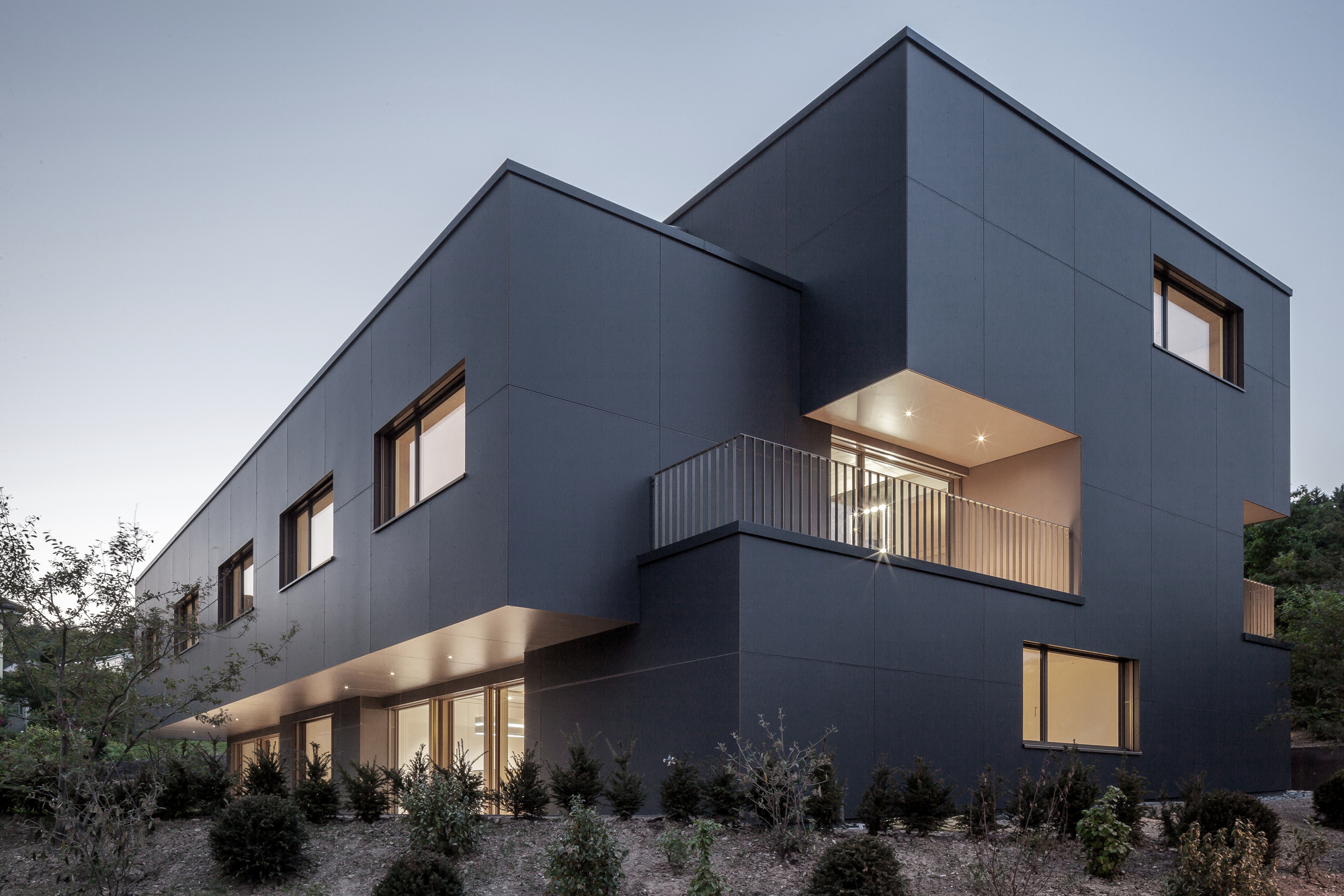 Gallery of Multi Unit House Riedholz / Tormen Architekten AG - 14