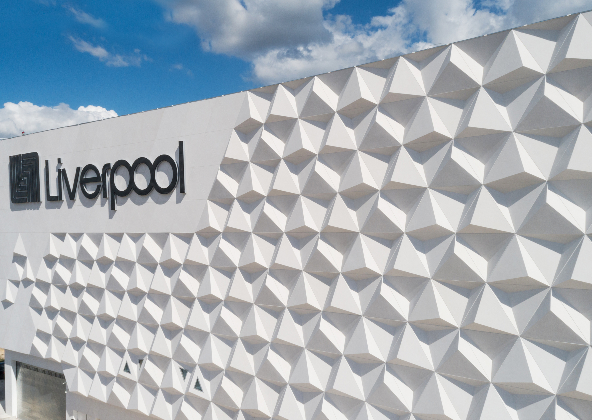 Galería de Fachada Liverpool Mérida / Miguel de la Torre Arquitectos - 11