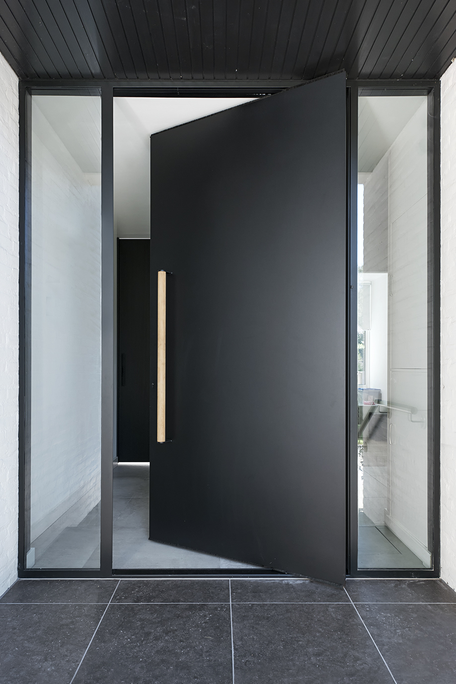 Gallery of 6 Ways to Enhance your Design with a Pivot Door - 10