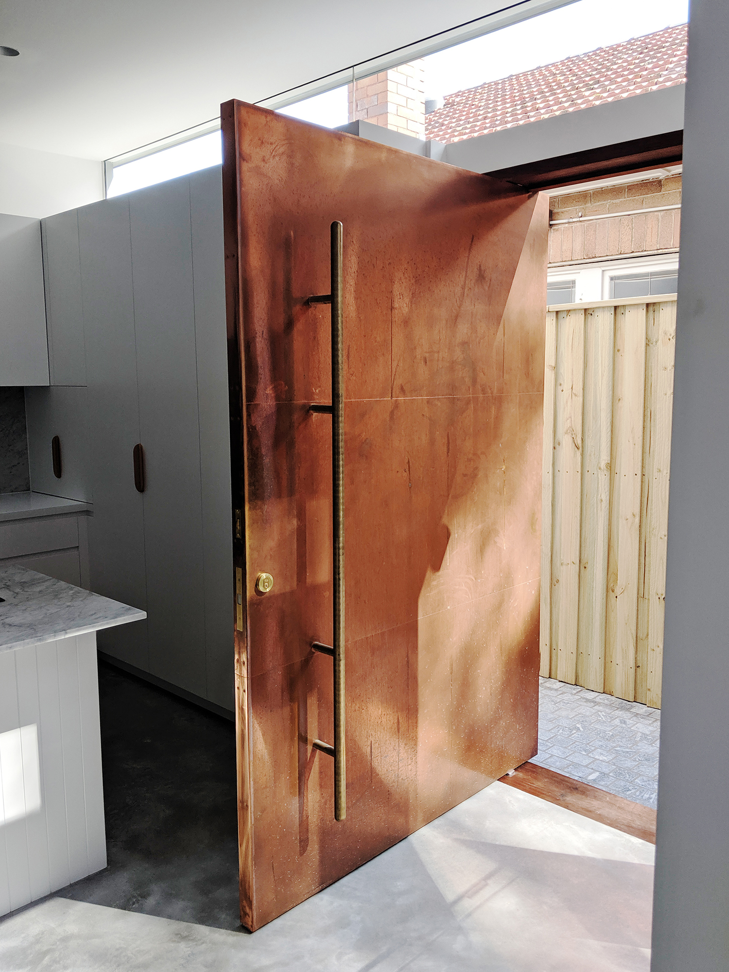 Gallery of 6 Ways to Enhance your Design with a Pivot Door - 14